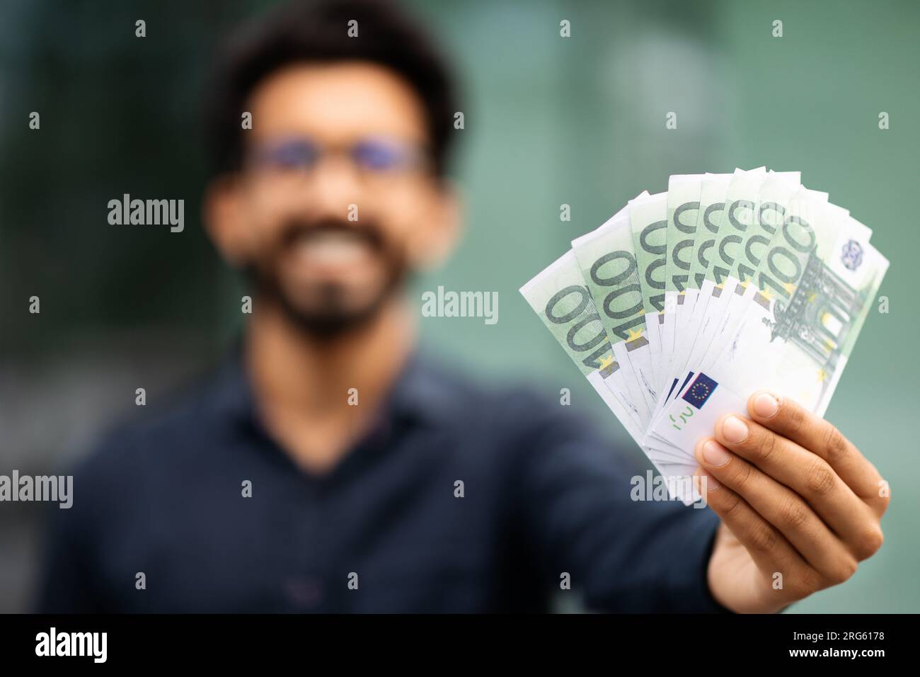 handsome man with euro cash money Stock Photo - Alamy