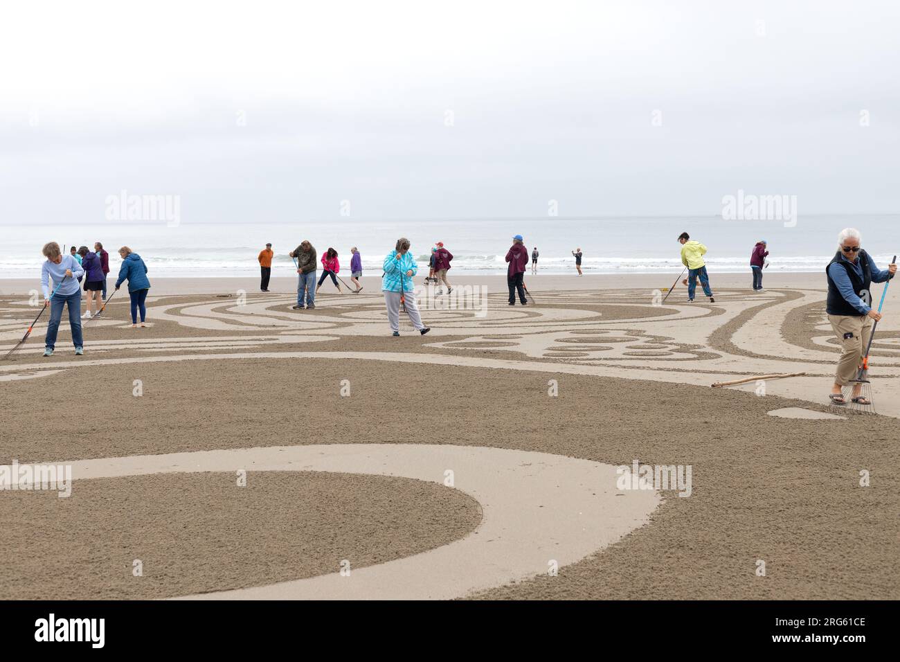 Circles in the Sand artists creating a sand labyrinth on Face Rock ...
