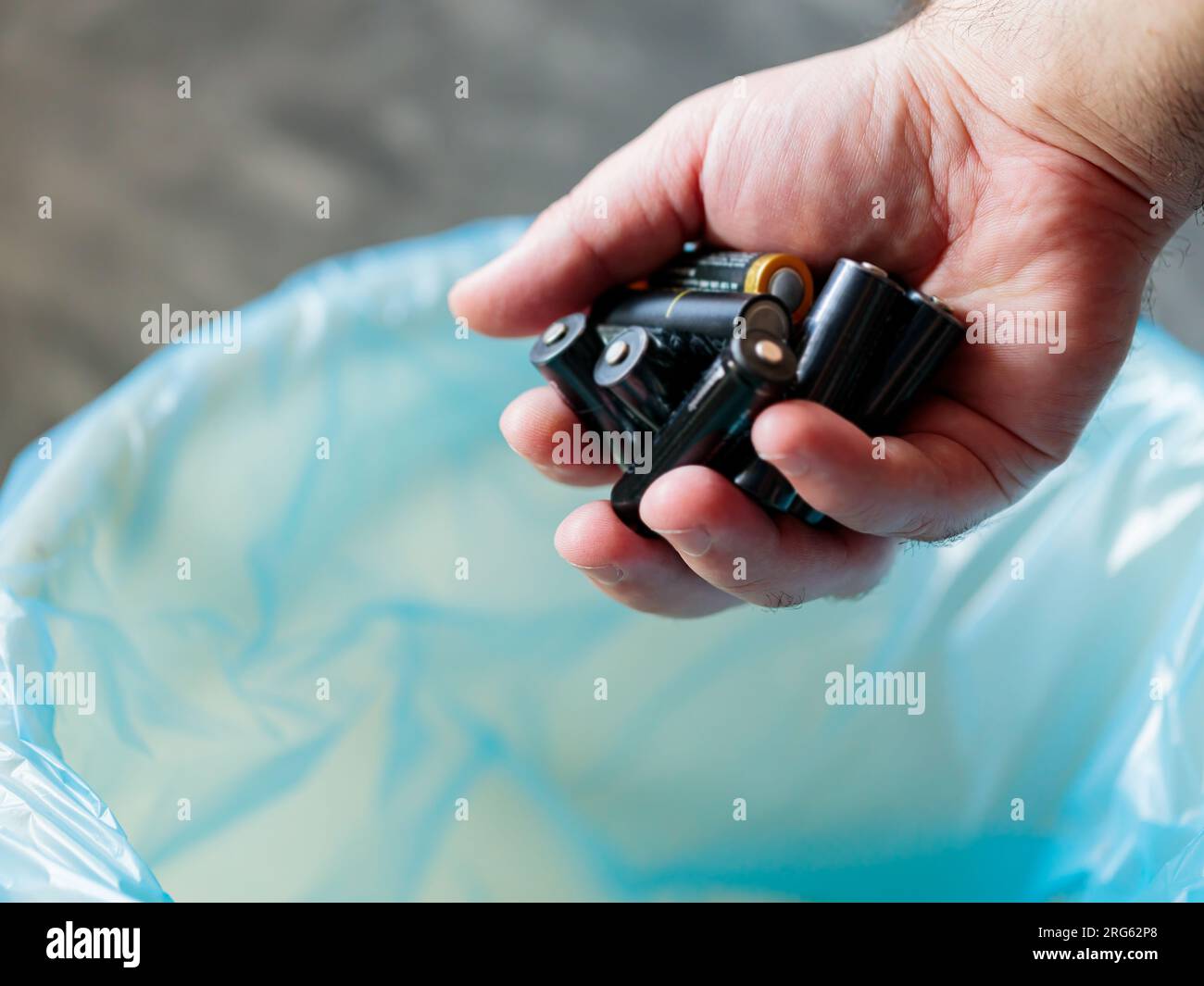 Sustainable Battery Recycling - Hand Discarding Used Batteries Stock ...