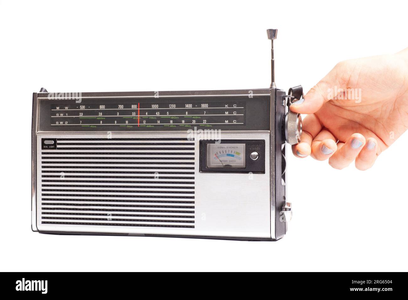 Hand tuning radio receiver button Stock Photo - Alamy