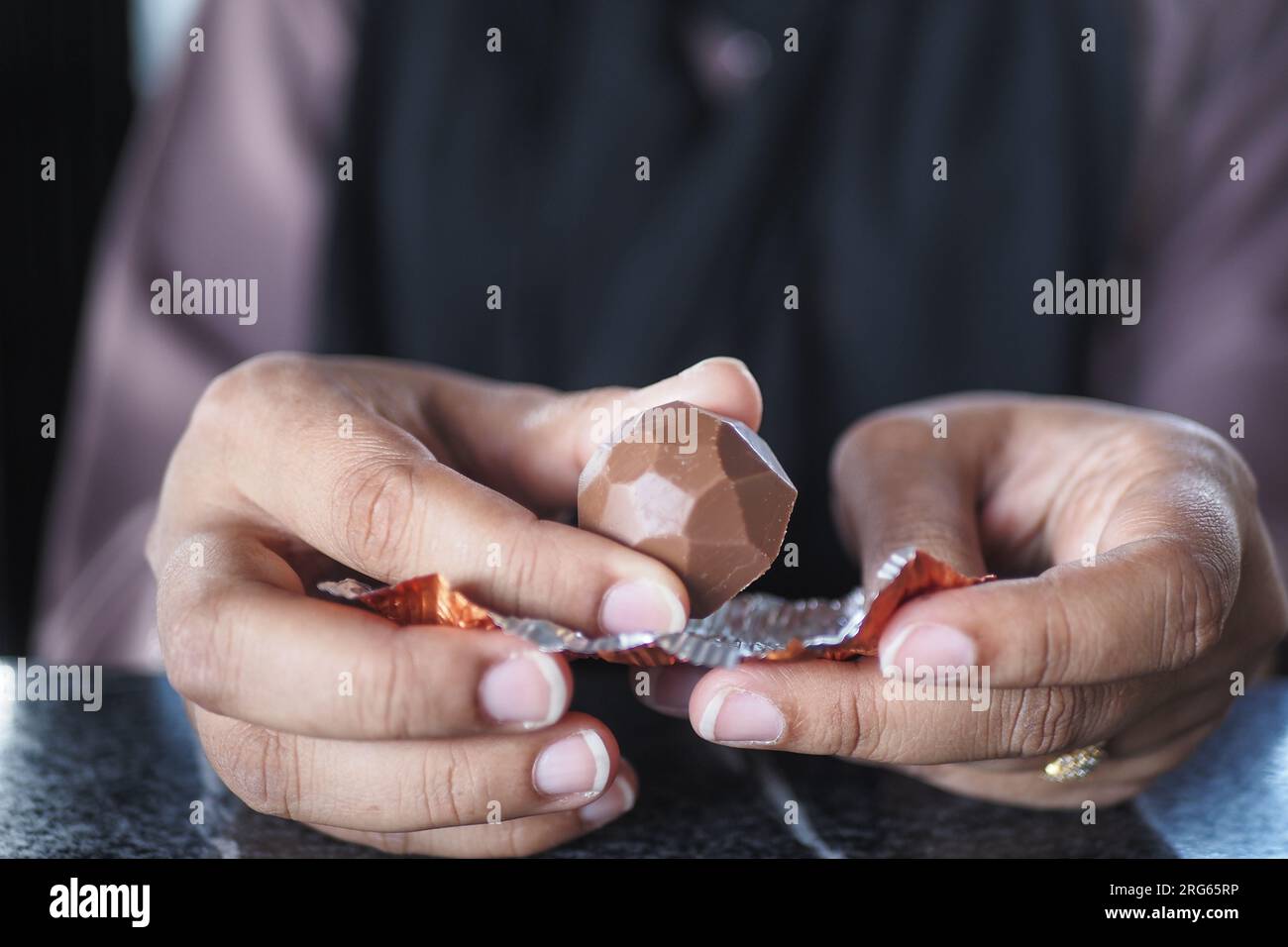 Removing packet from chocolate hi-res stock photography and images - Alamy