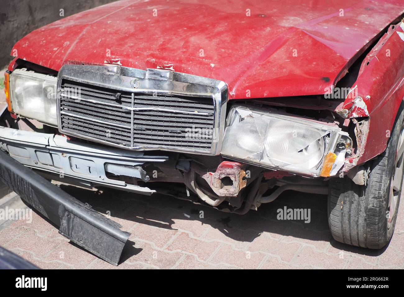 red car damaged by a road accident Stock Photo - Alamy