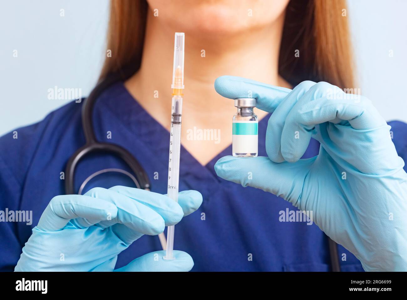 Vial vaccine and disposable syringe for injection in doctor hands Stock ...