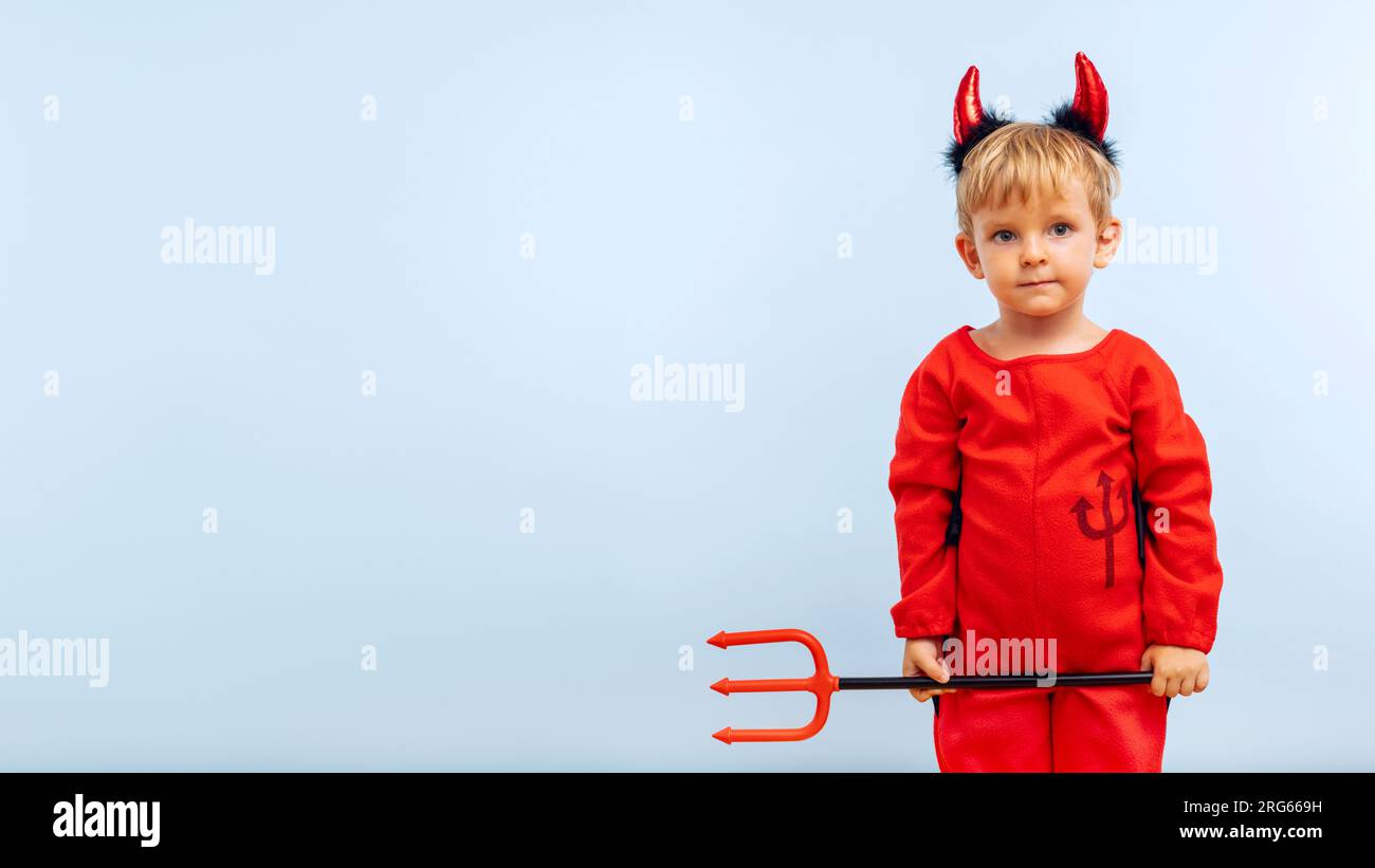 Child boy devil horns trident hi-res stock photography and images - Alamy