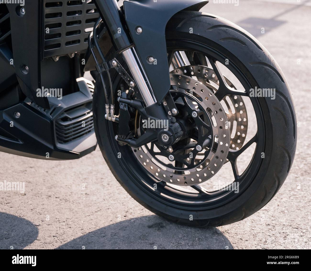 Close-up of a wheel with a motor of an electric motorcycle Stock Photo ...