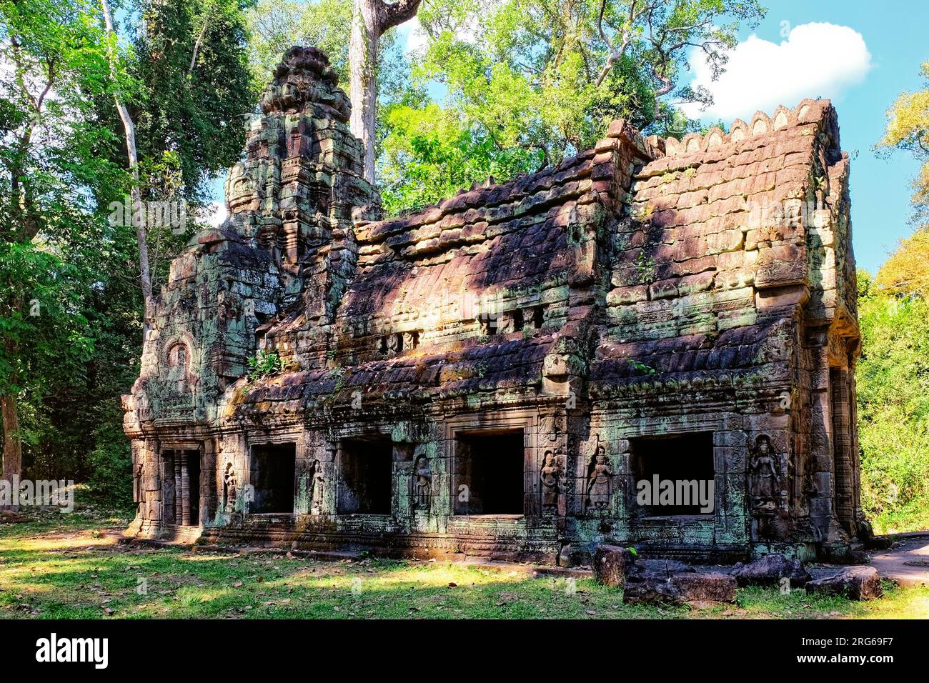 Time's embrace: An old abandoned Khmer building embraced by the ...