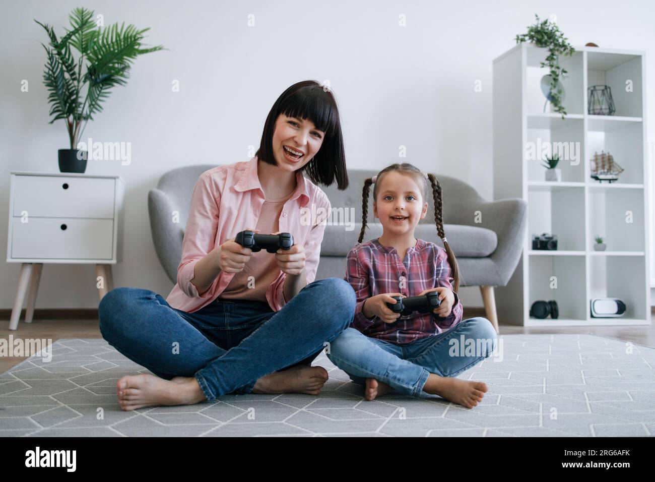 Mother consoles daughter hi-res stock photography and images - Alamy