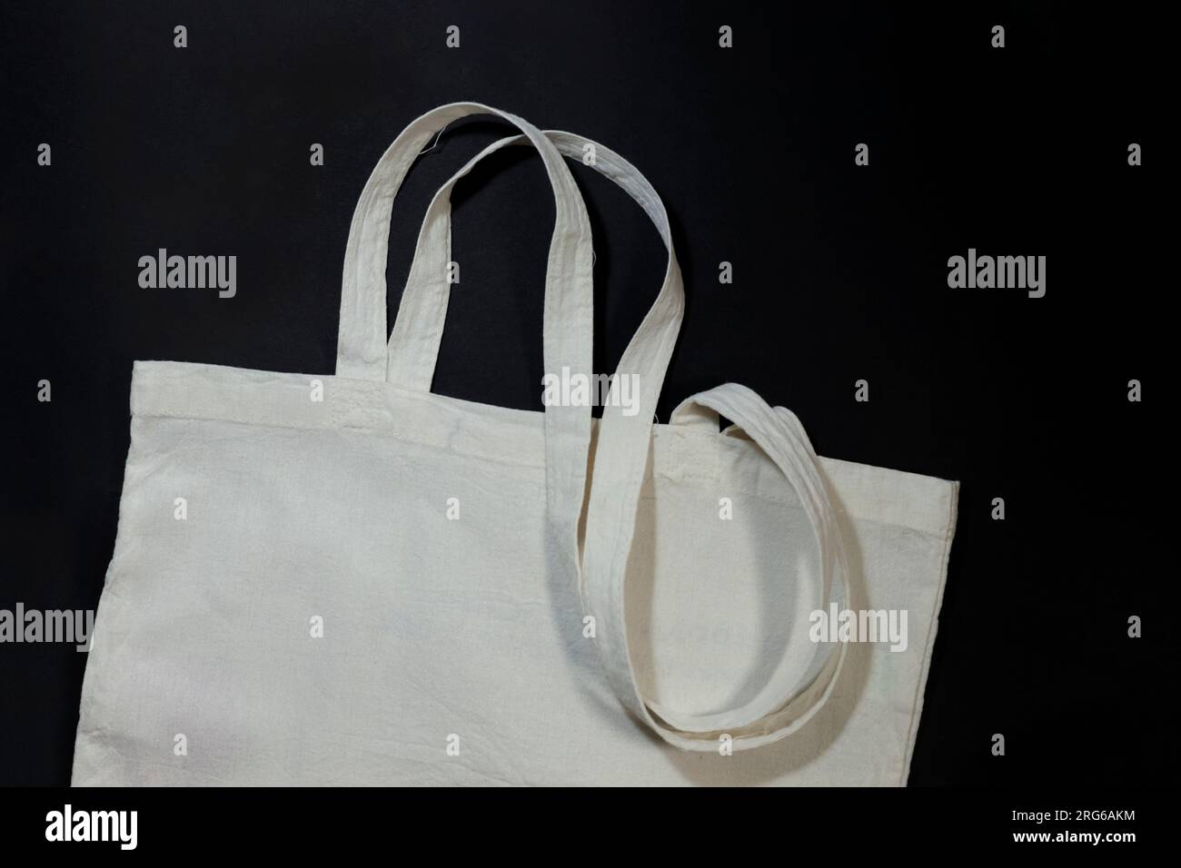 White cotton or mesh bag on black background. Zero waste, no plastic ...