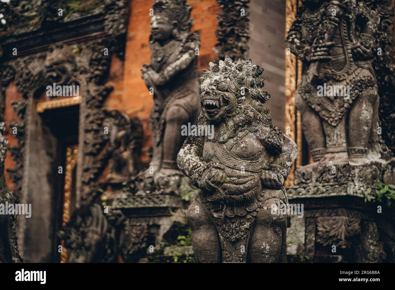 Ubud temple decorative stone statues. Balinese religious sacred ...