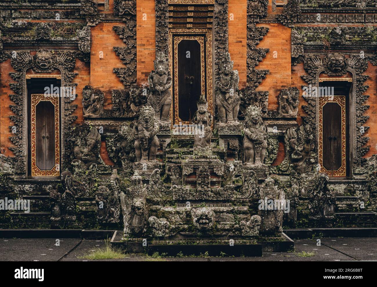 Ubud temple decorative stone statues. Balinese religious sacred ...