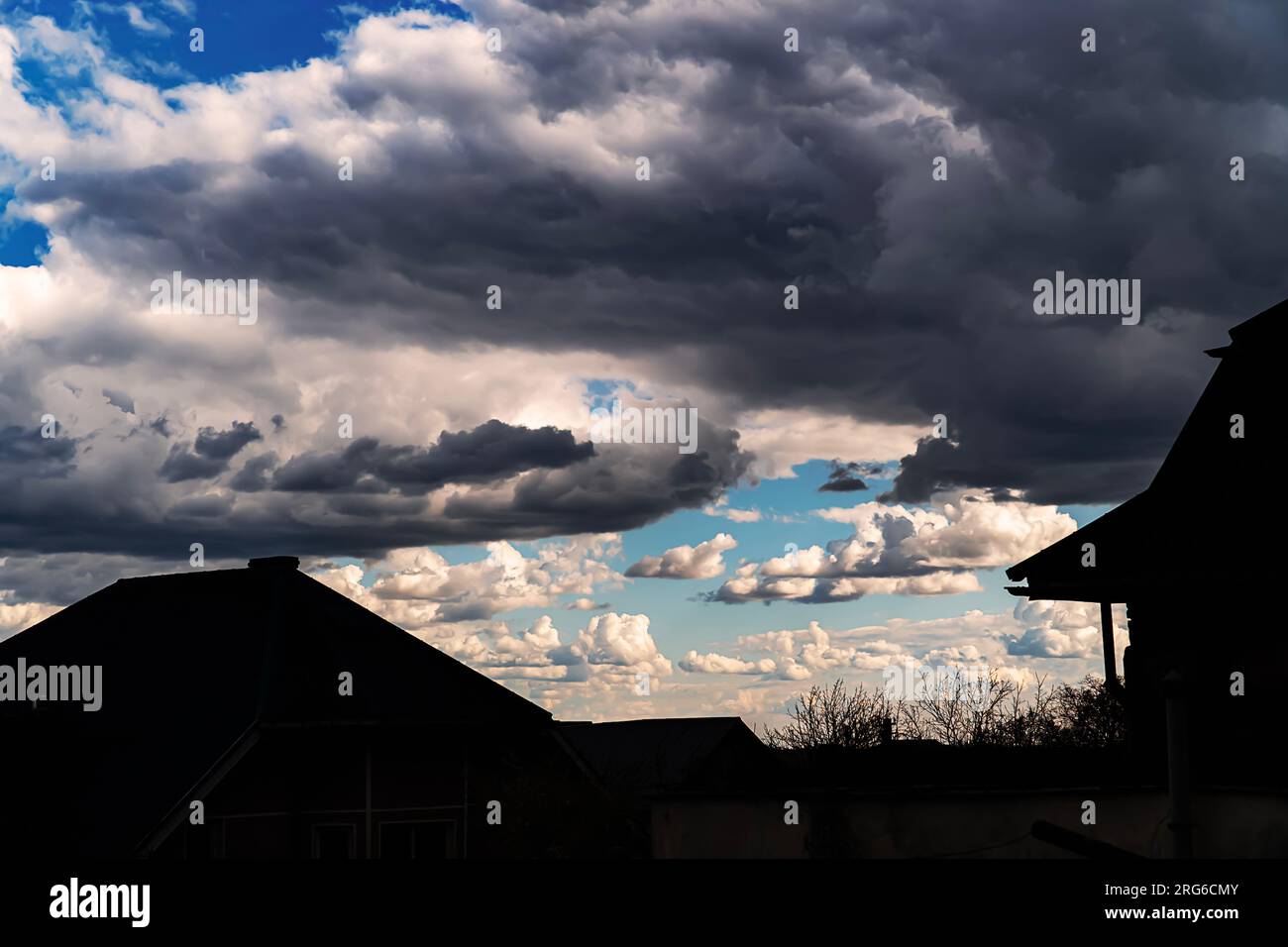 Thunder clouds gathering over the city leading into the distance ...