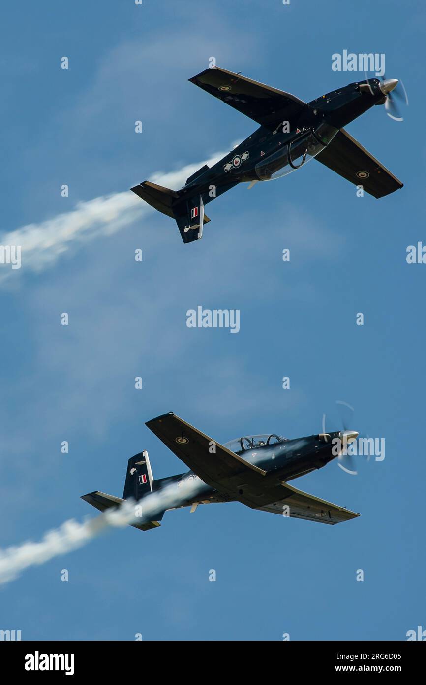 Royal New Zealand Air Force Black Falcons T-6C aircraft perform an aerobatic display Stock Photo ...