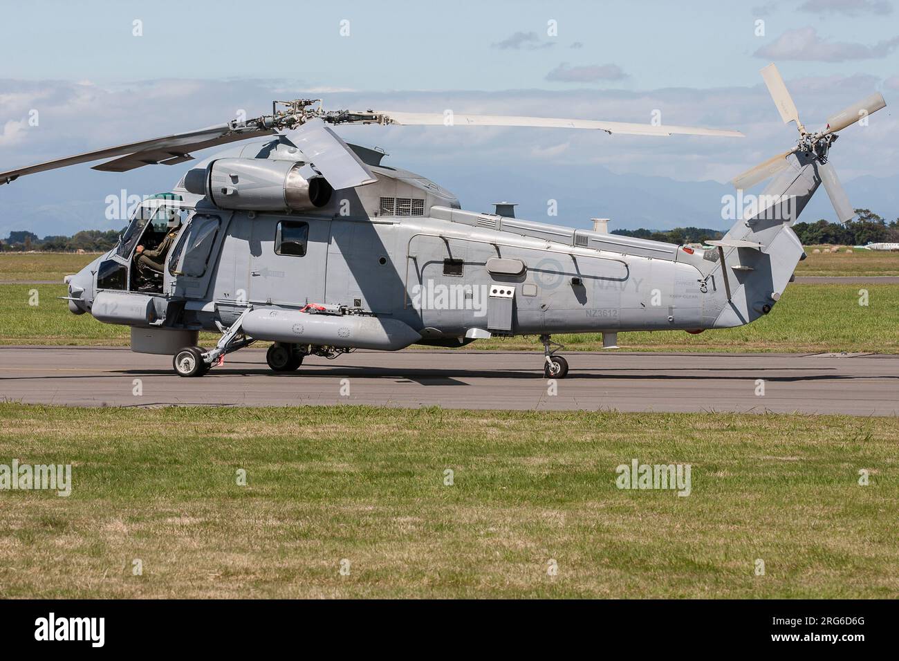 A Royal New Zealand Navy SH-2G(I) Super Seasprite basking in the sun at ...
