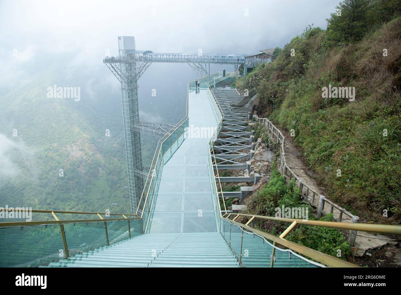 The cloudy scenic view of a transparent Glass Bridge built 2333 meters ...
