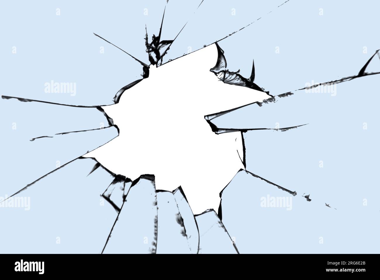 A hole in a broken window. Cracked glass texture Stock Photo - Alamy