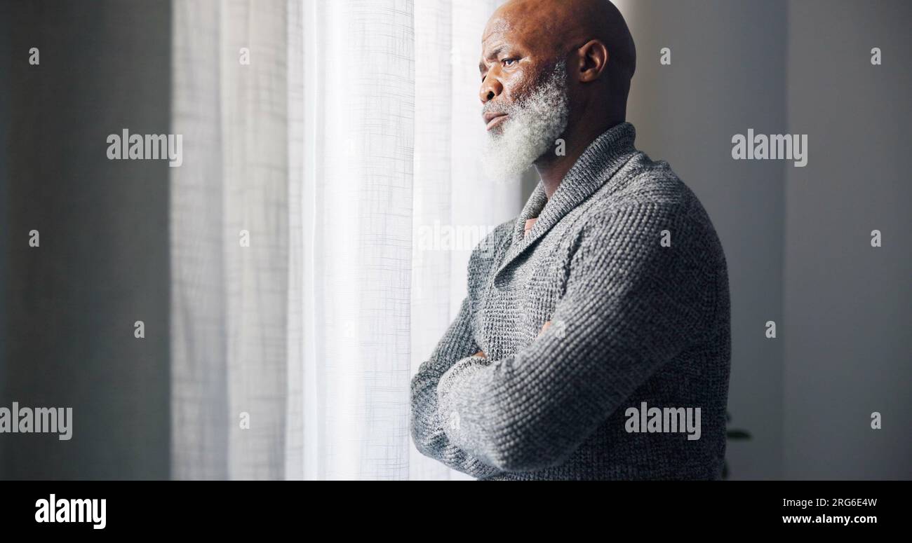 Depressed, sad and senior man in home with mourning and memory with ...