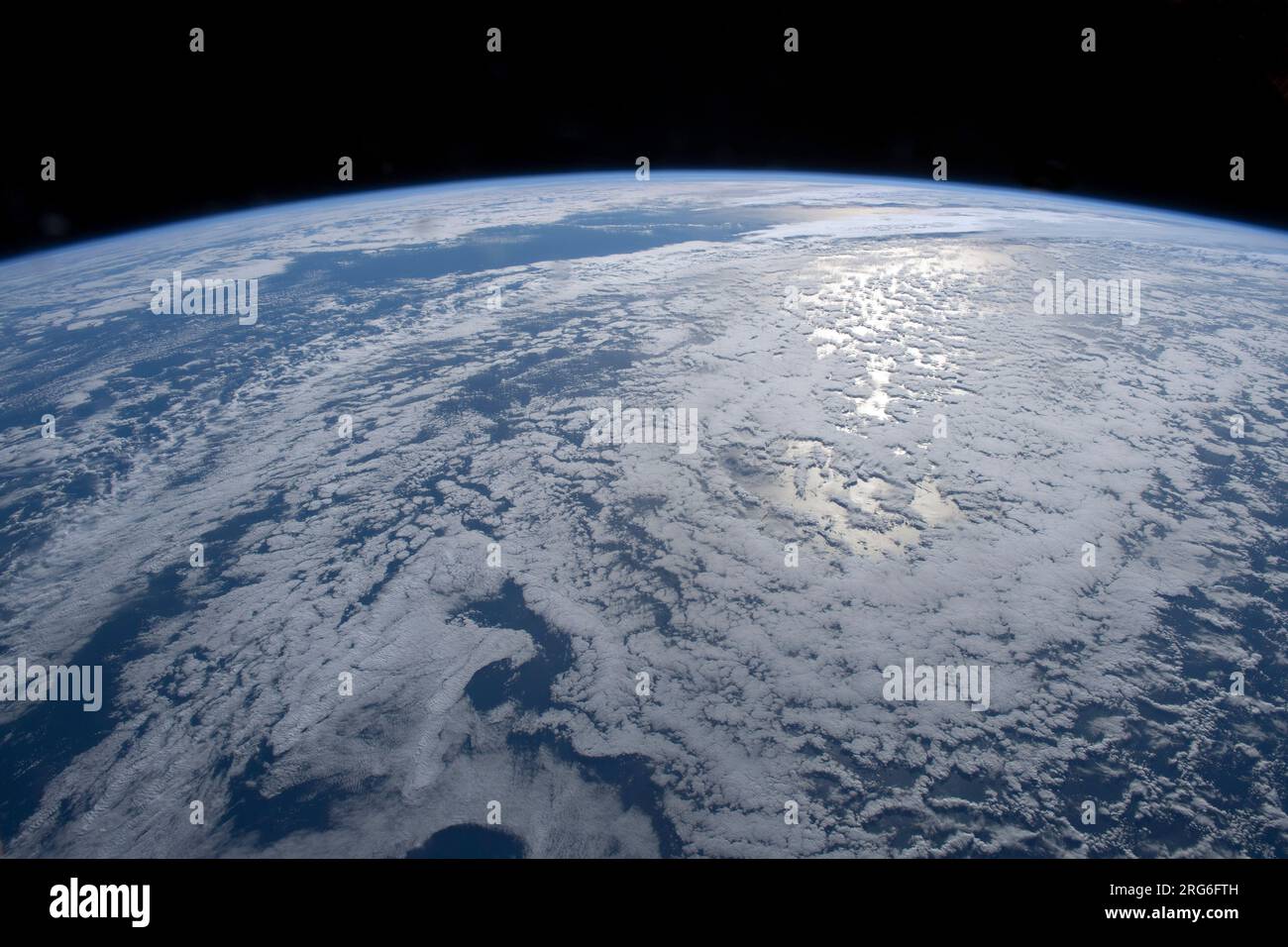View from space of the sun's glint beaming on the South Pacific Ocean ...