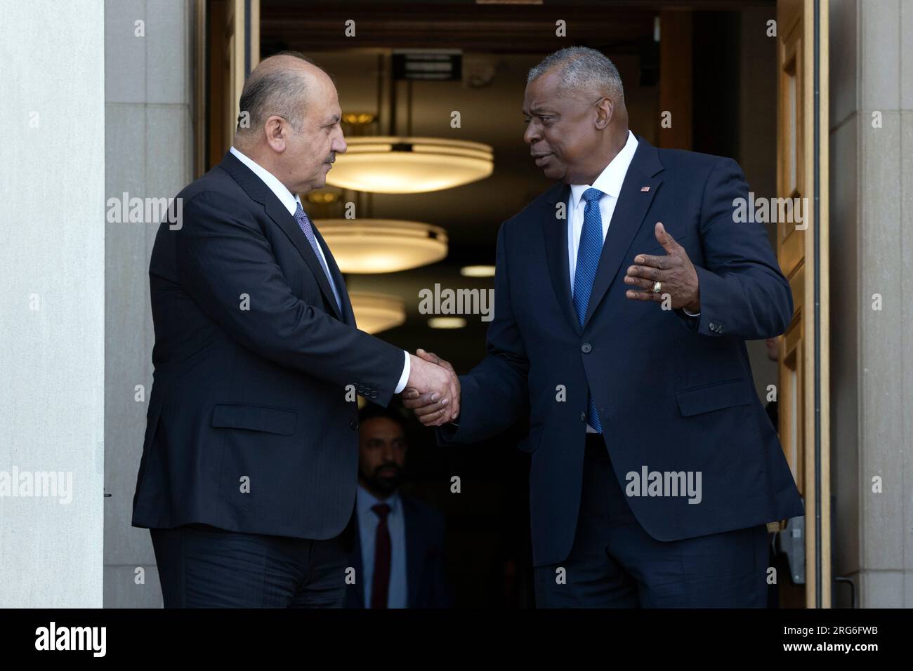 Secretary of Defense Lloyd Austin and Iraq's Minister of Defense Thabit ...