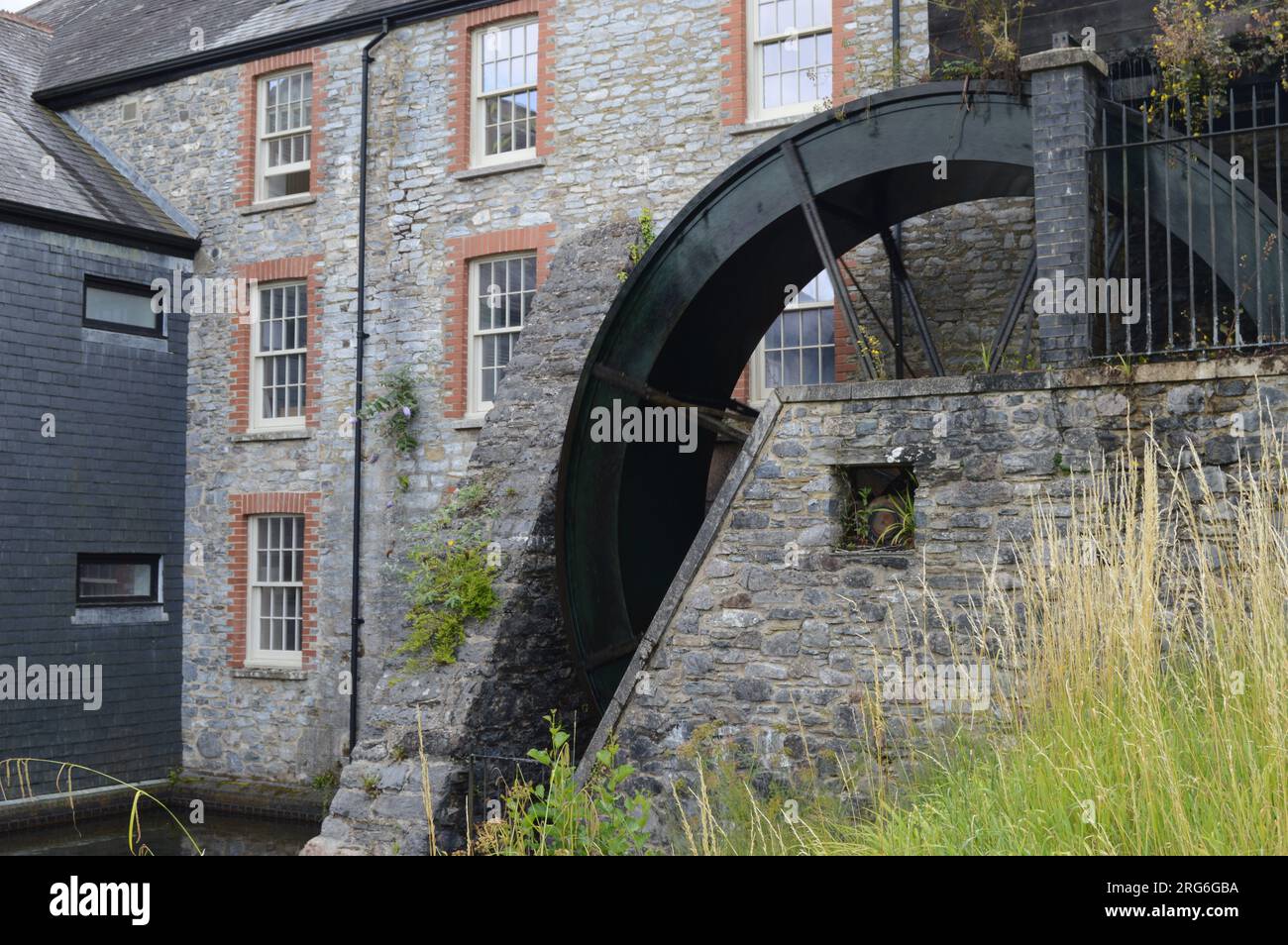 Water Mill at Buckfast Abbey, Devon, powered by water from overhead ...