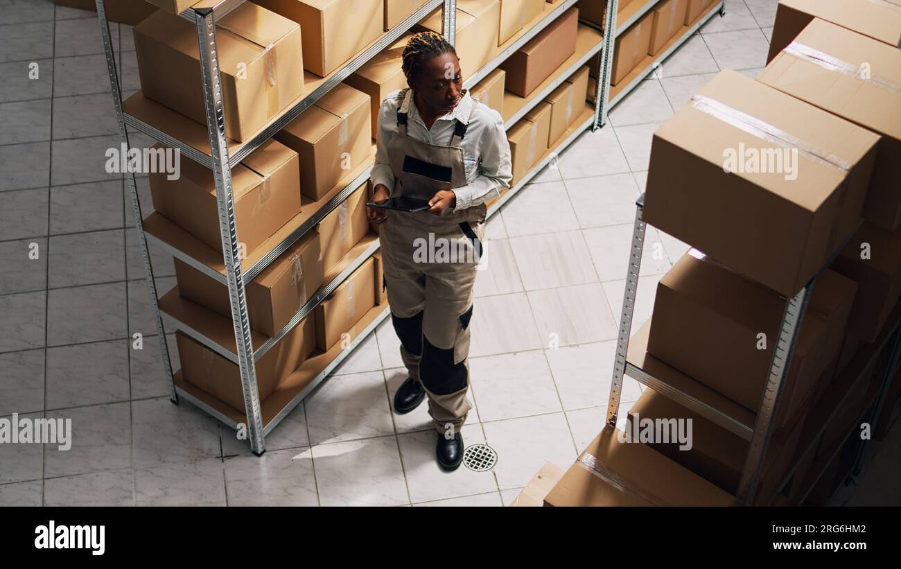 Diverse people checking inventory stock hi-res stock photography and ...