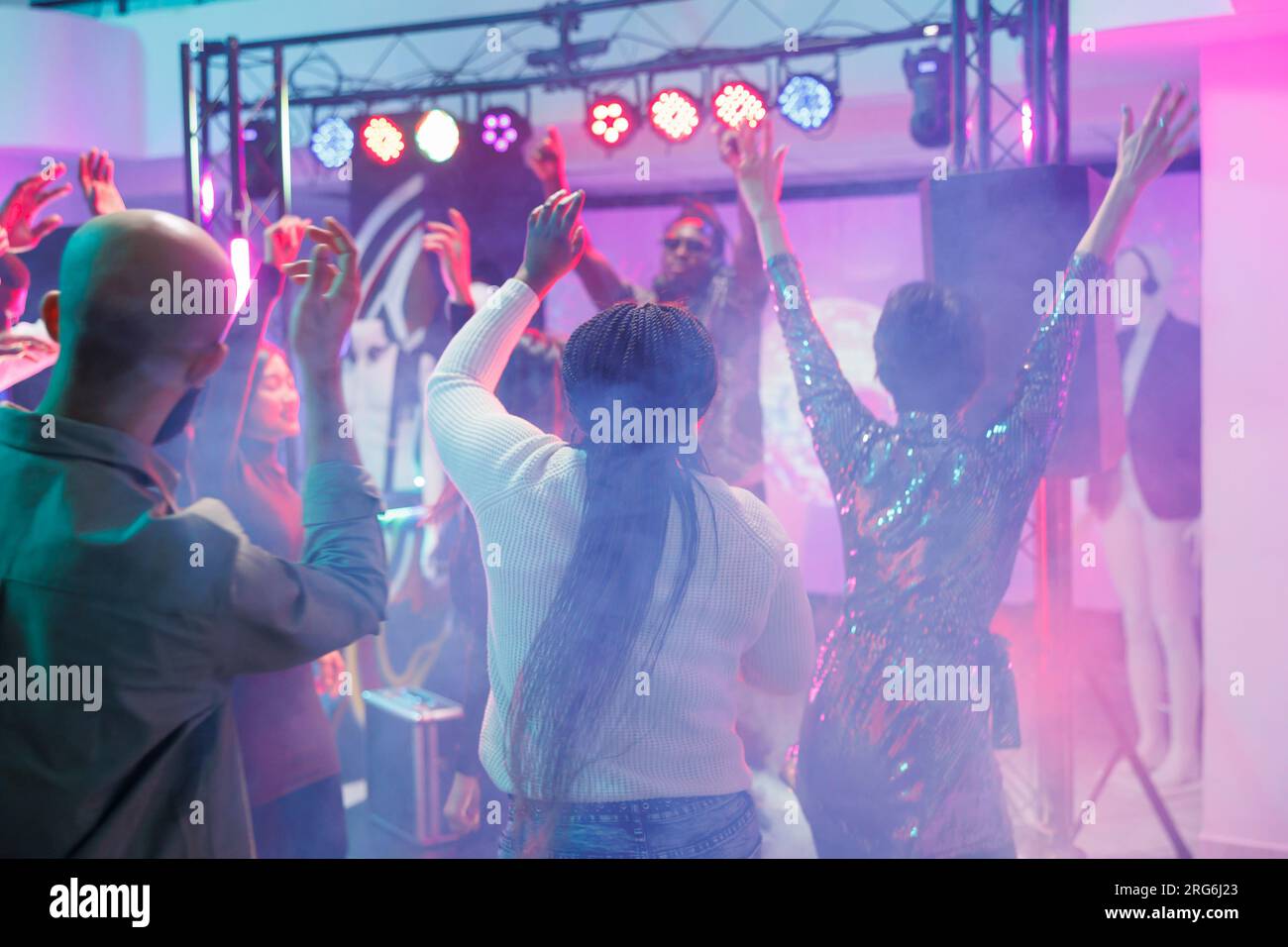 Energetic crowd dancing enjoying hi-res stock photography and images ...