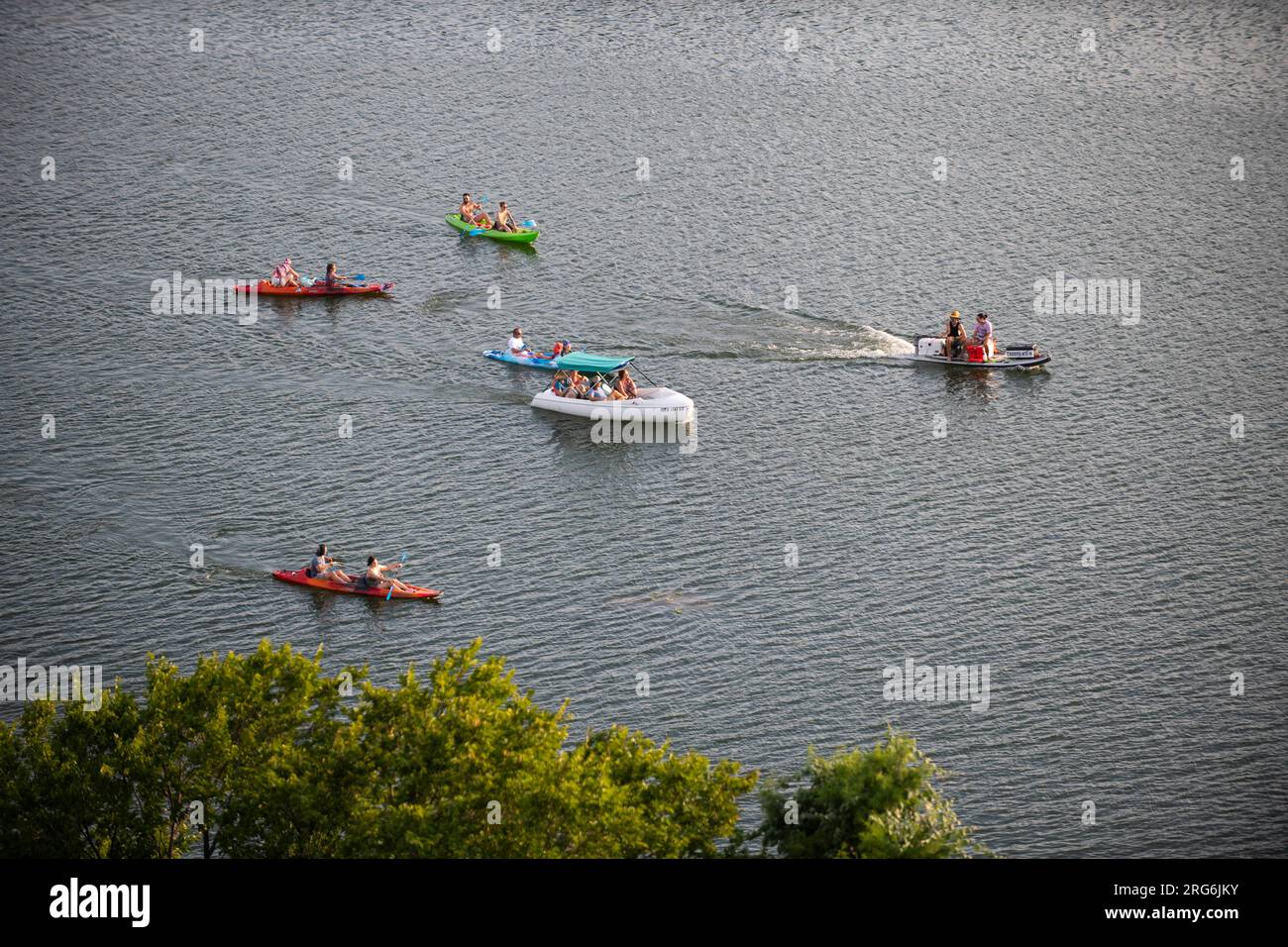 Central Texans enjoy the calm waters of Lady Bird Lake in downtown ...