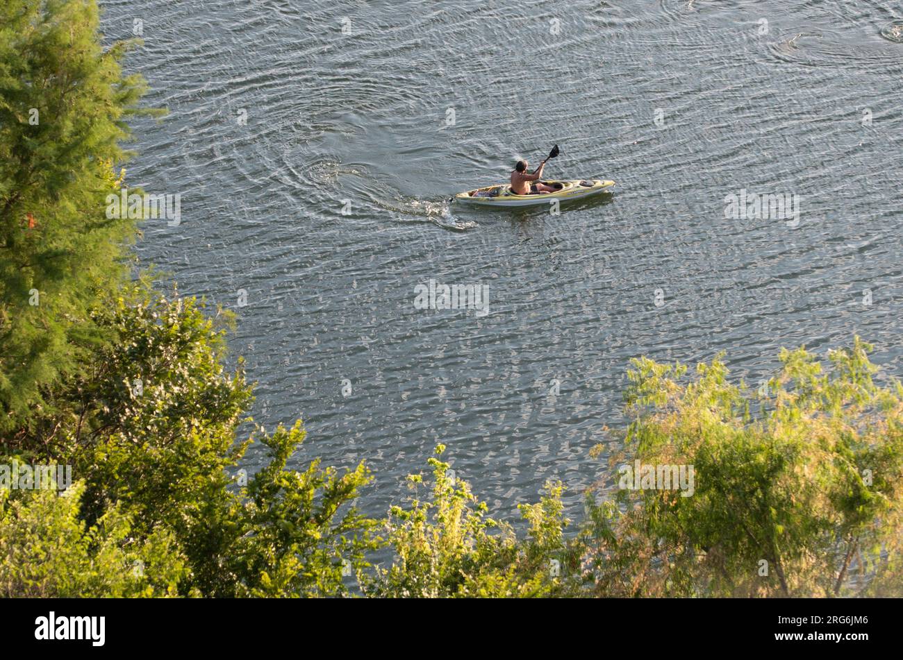 Central Texans enjoy the calm waters of Lady Bird Lake in downtown ...