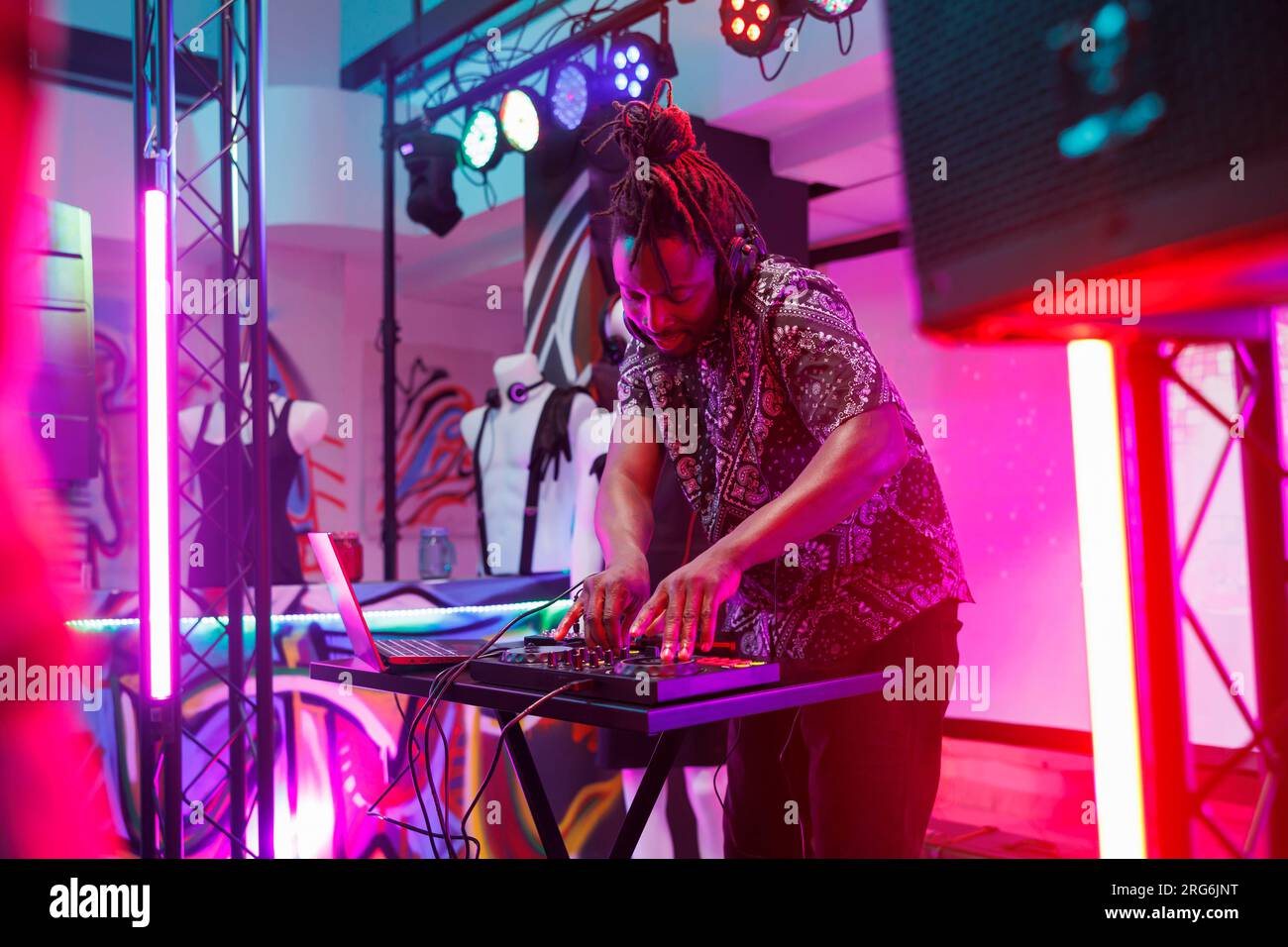 African american musician performing live on stage with spotlights at ... African american musician performing live on stage with spotlights at ...