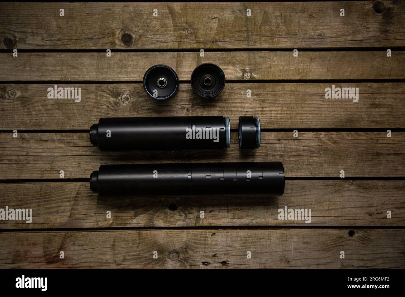 Black silencer for weapons. Suppressor that is at the end of an assault ...