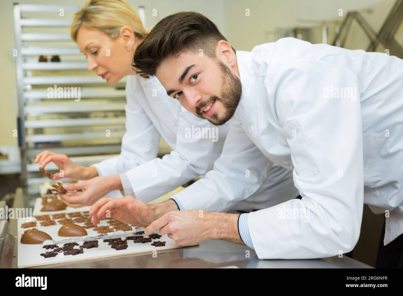 Hand piping chocolate hi-res stock photography and images - Alamy