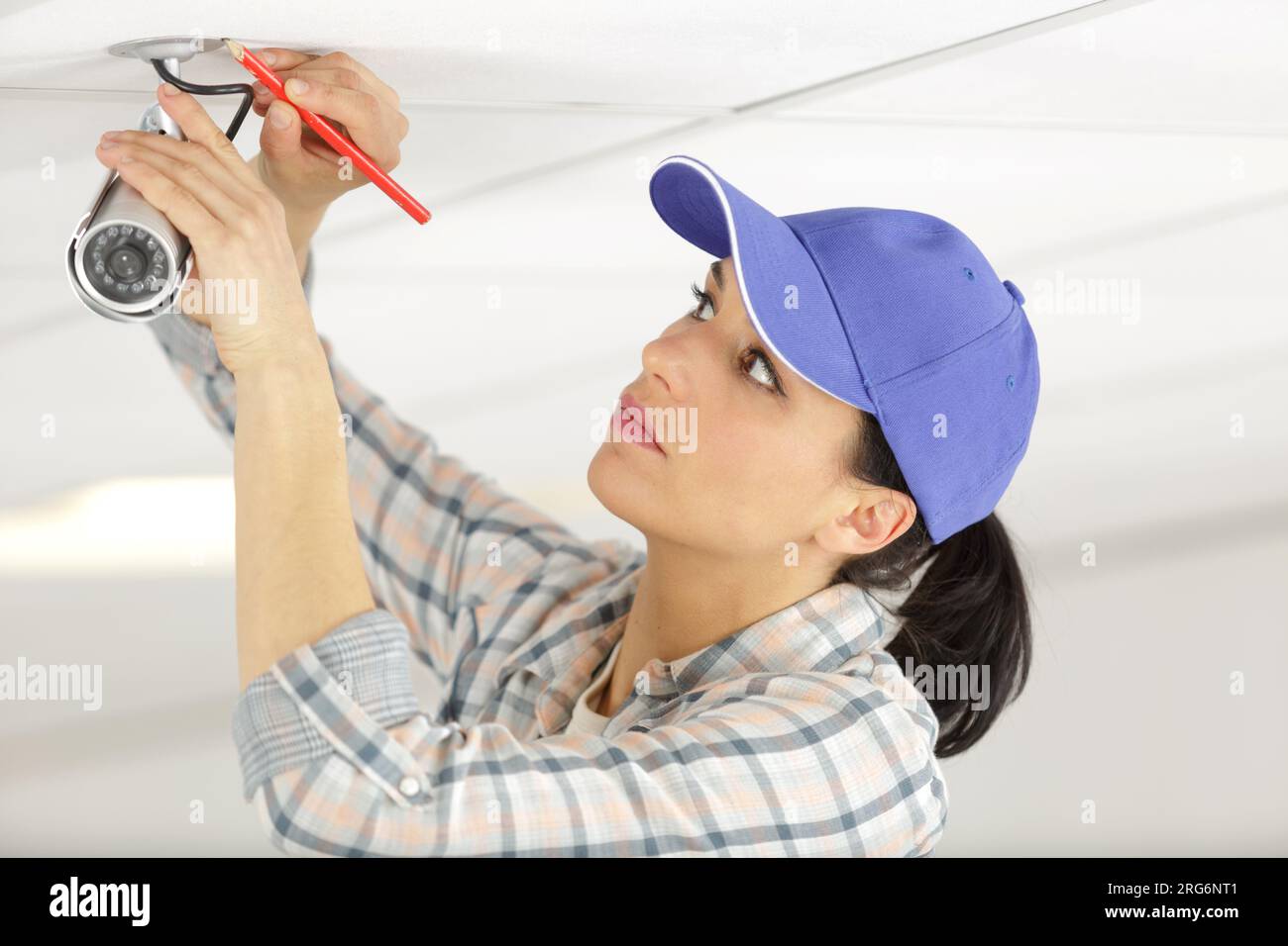Checking home surveillance hi-res stock photography and images - Alamy
