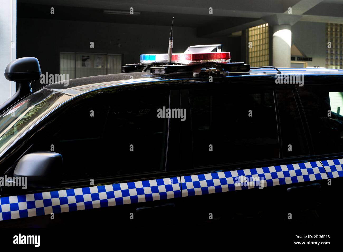 Part of Police vehicle with flashlights Stock Photo - Alamy