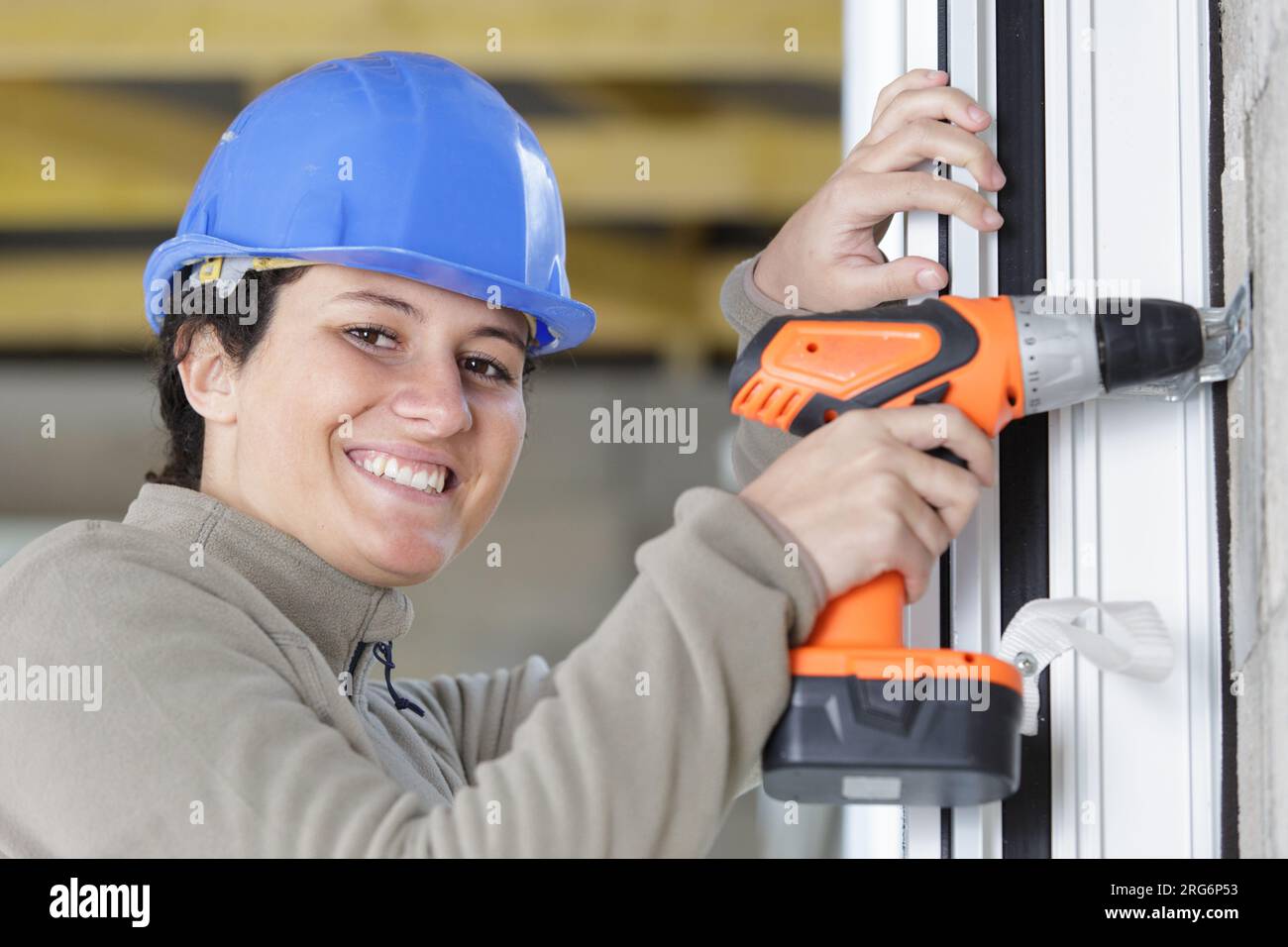 Female carpenter hand drill hi-res stock photography and images - Alamy