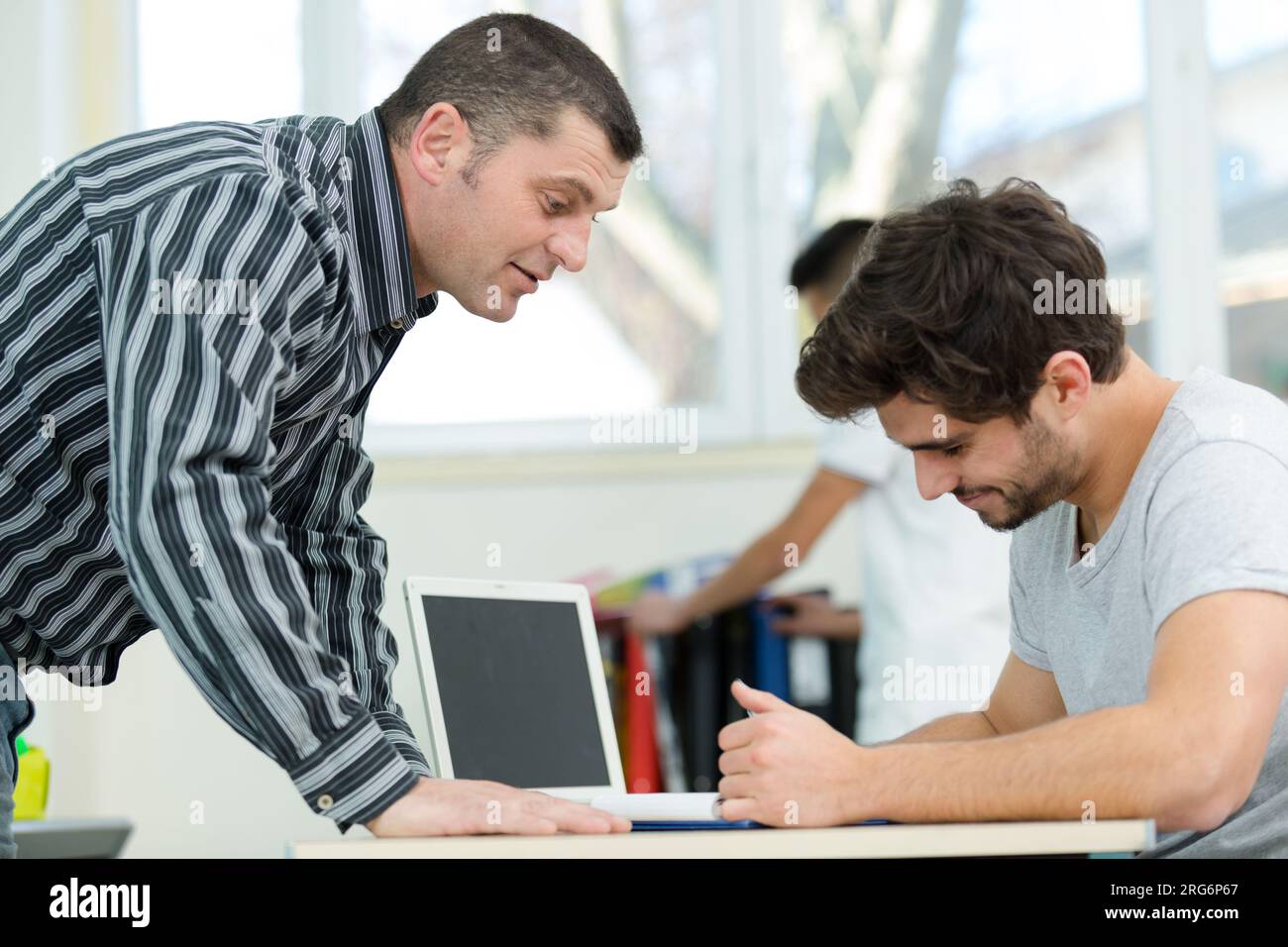 professor of a coaching and review center Stock Photo - Alamy