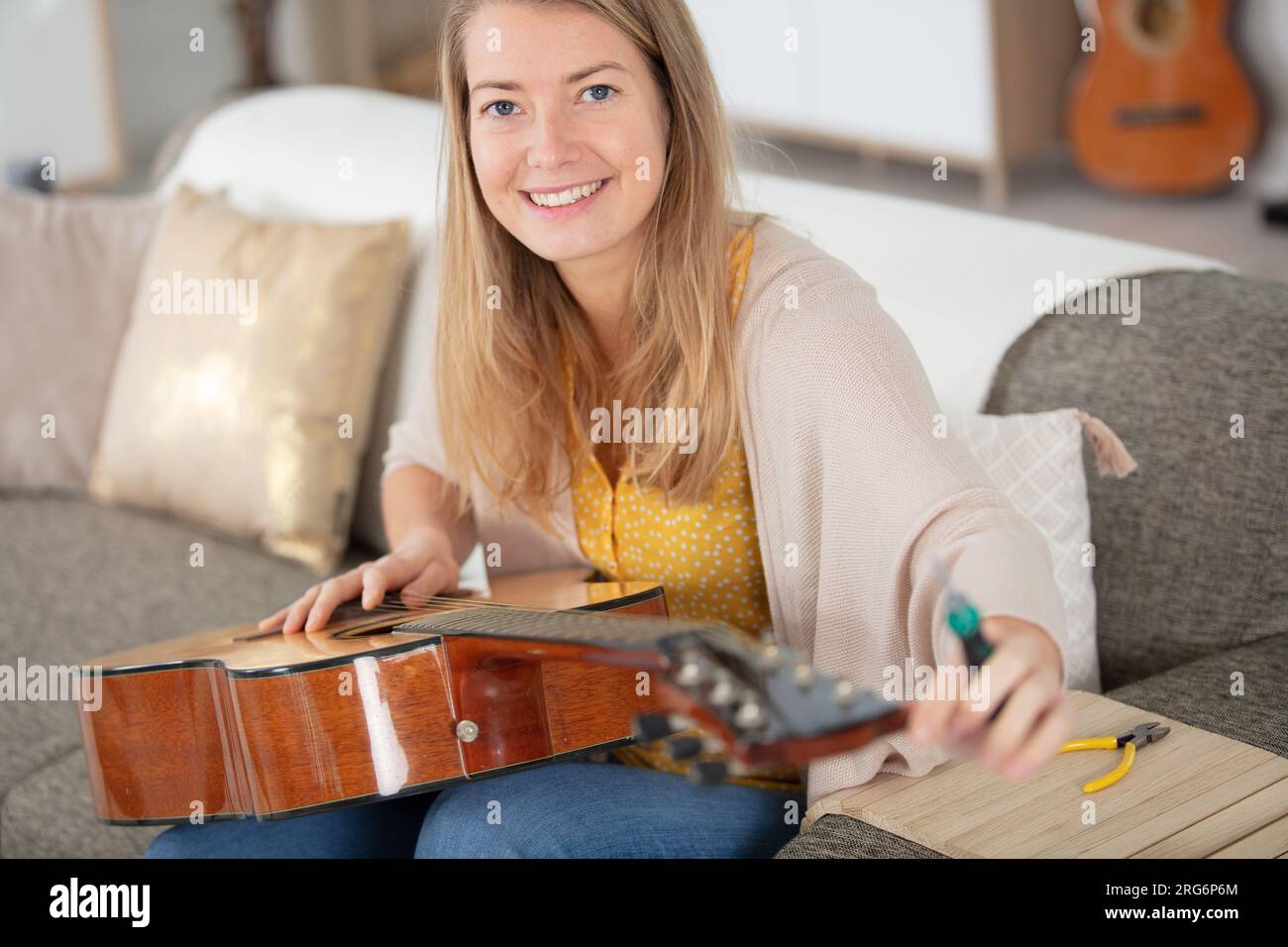 Woman tuning hi-res stock photography and images - Alamy