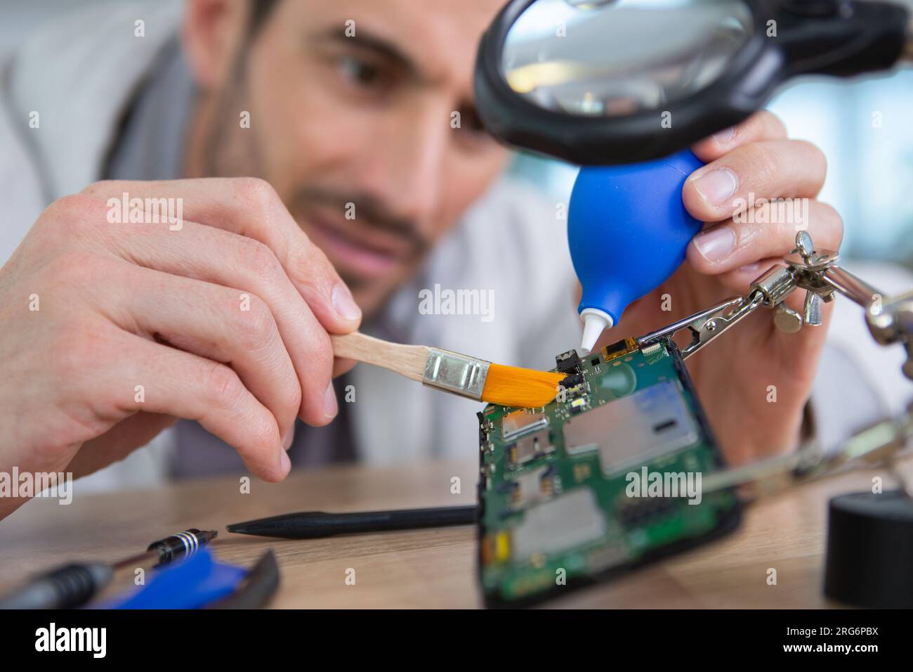 Electronics design engineer working circuit hi-res stock photography ...