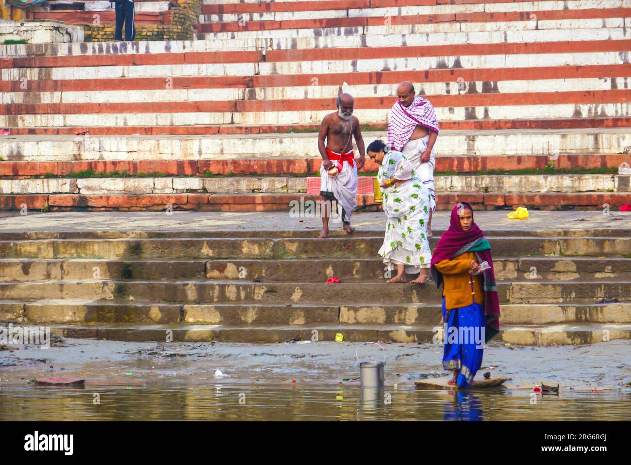 VARANASI - INDIA, JANUARY 1: Hindu people wash themselves in the river ...