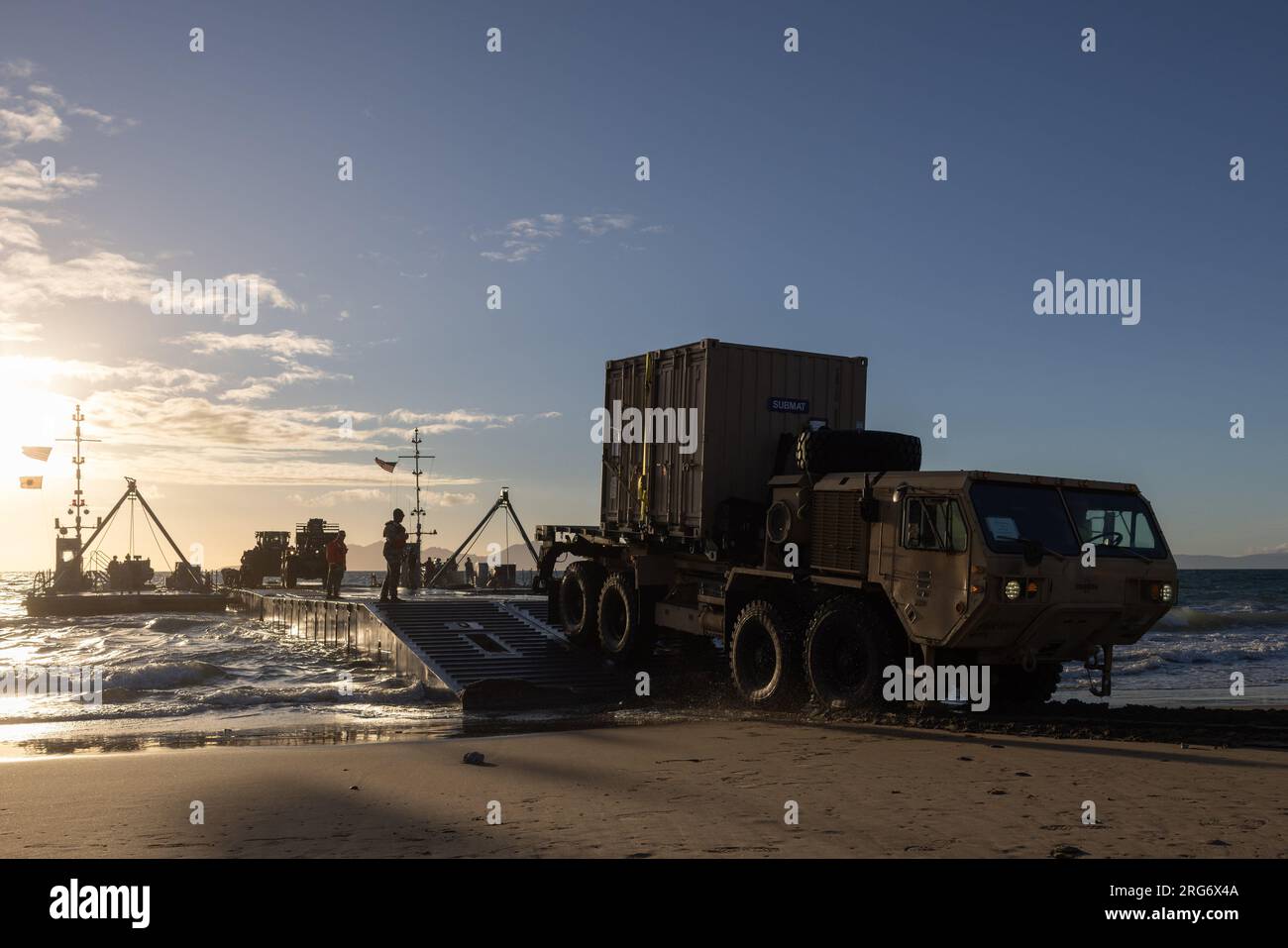 United States Army vehicle successfully lands on the beach from a ...