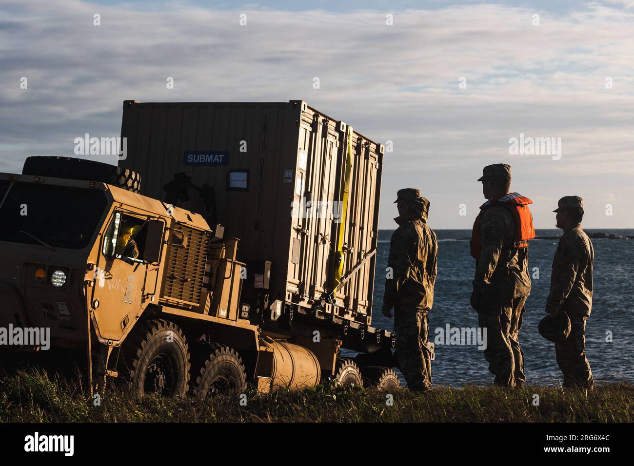 United States Army vehicle successfully lands on the beach from a ...