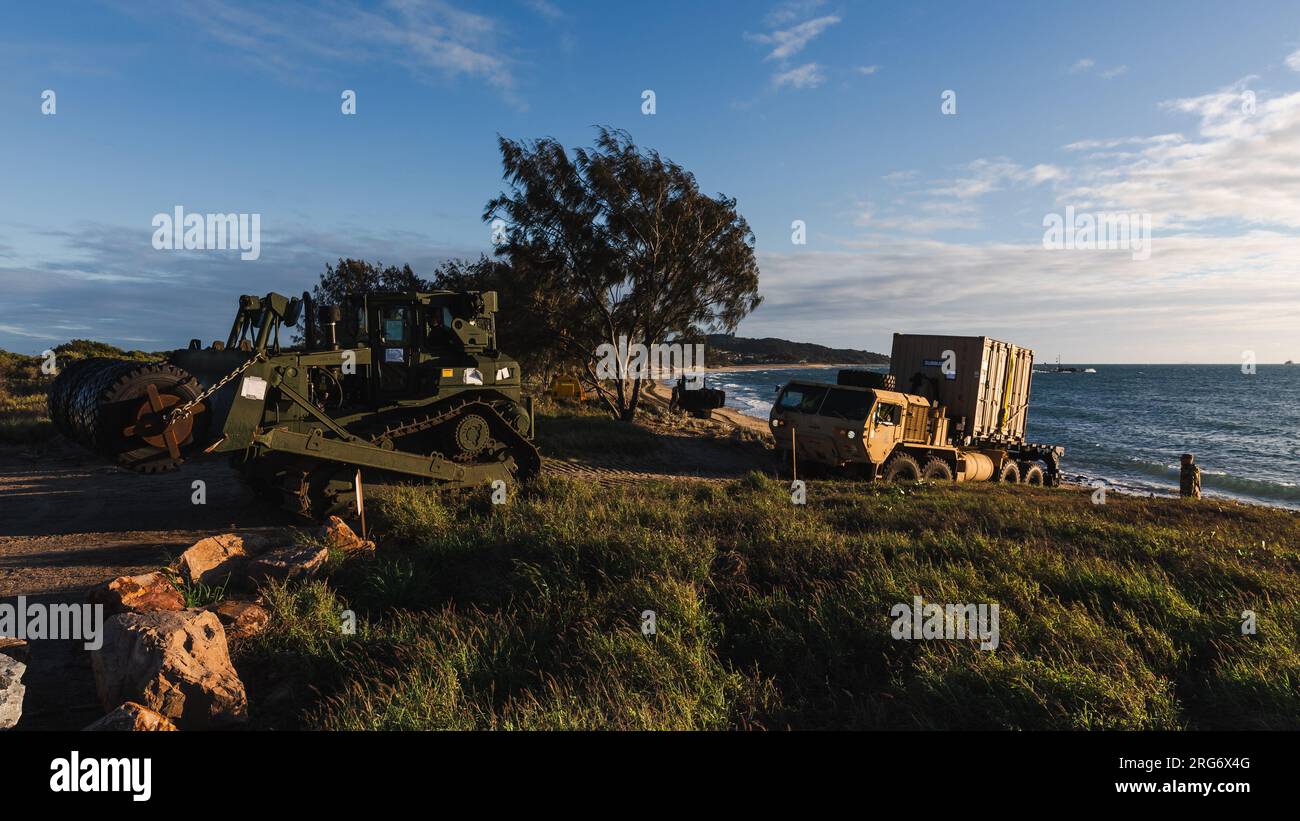 United States Army vehicles successfully land on the beach from a ...