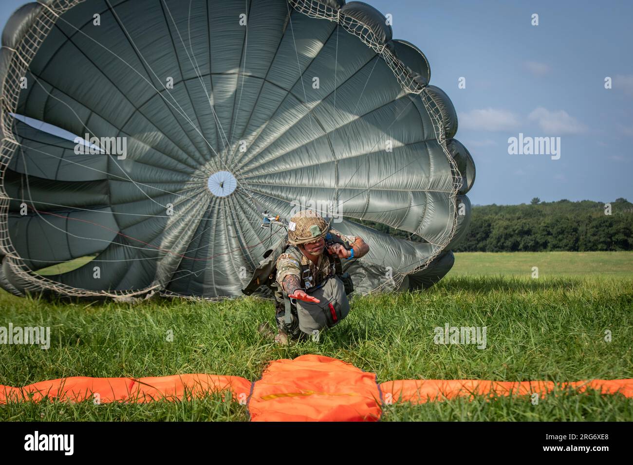A British Paratrooper dives to reach the target with his MC-6 parachute ...