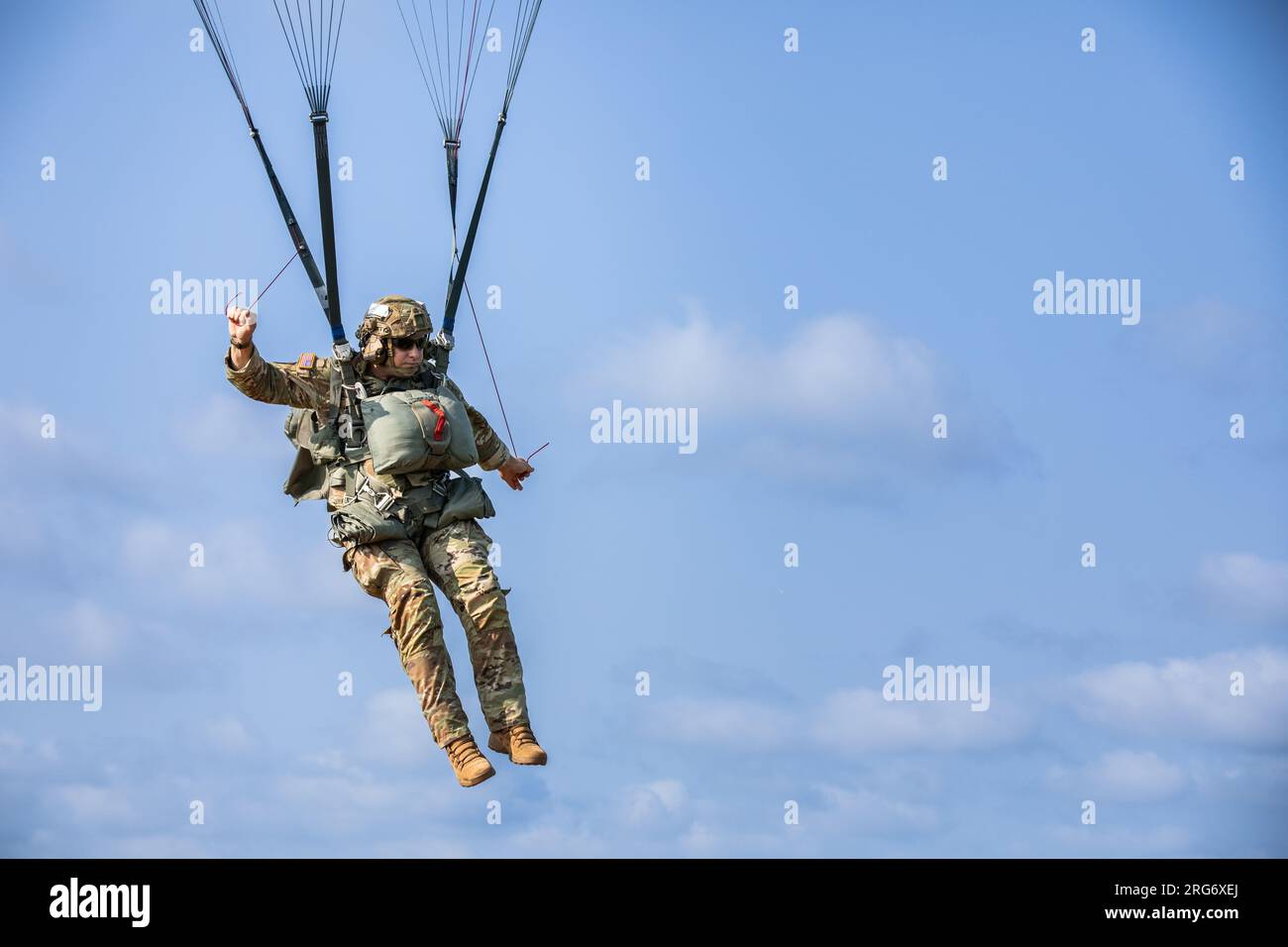 A U.S. Army Paratrooper descends onto Glen Rock Drop Zone from a Ch-47 ...