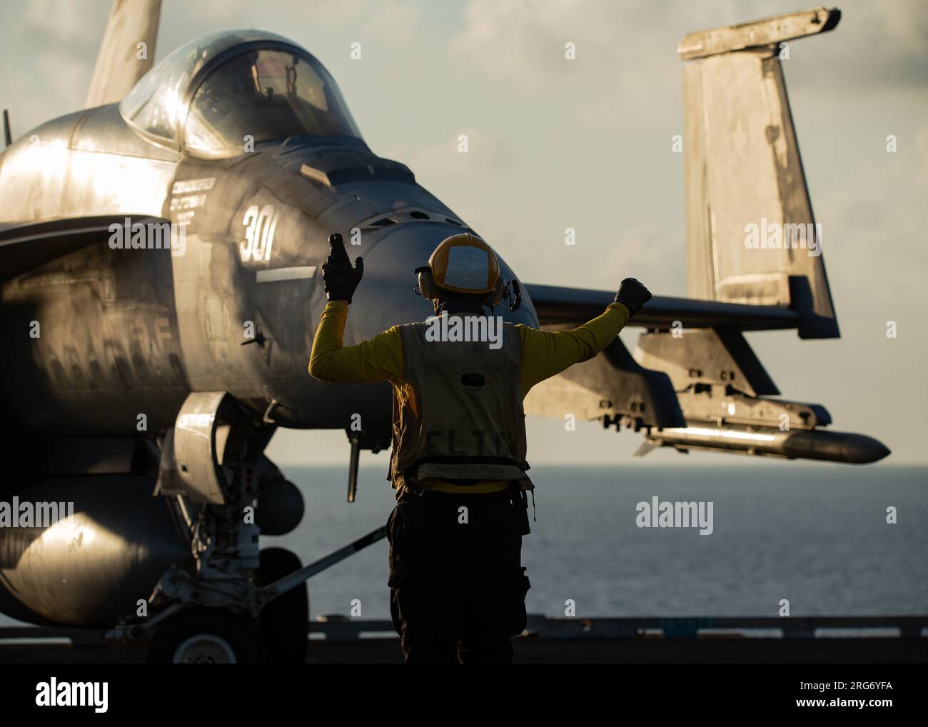 Aviation Boatswain's Mate (Handling) 2nd Class Bernard Glover, from Jacksonville, Florida ...