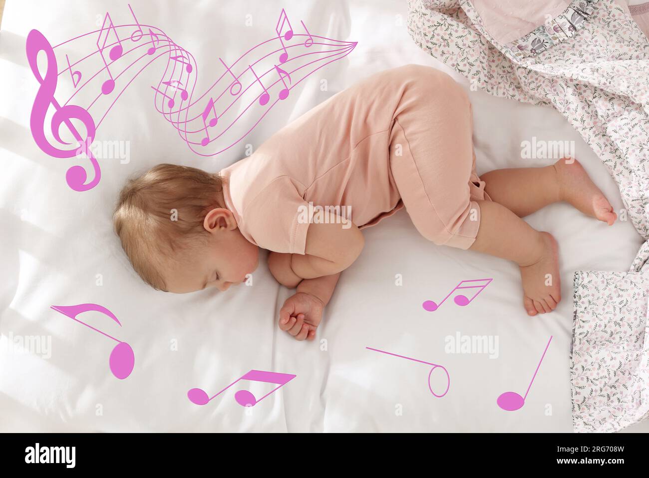 Lullaby songs. Cute little baby sleeping on bed, above view ...