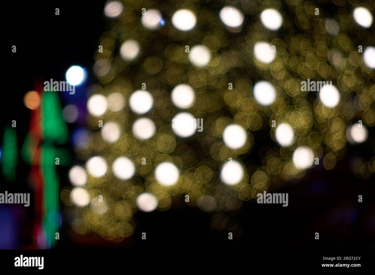Abstract Blurred Christmas Lights gold Bokeh Background Stock Photo - Alamy