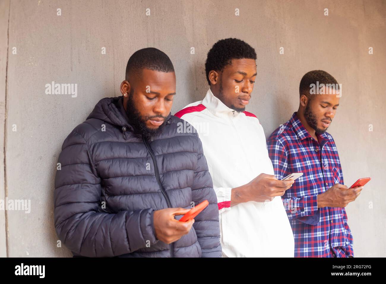Group of multicultural friends using smartphone outdoors - People hands ...