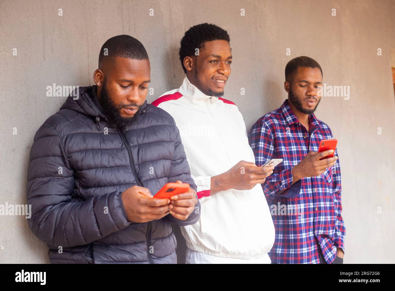Group of multicultural friends using smartphone outdoors - People hands ...