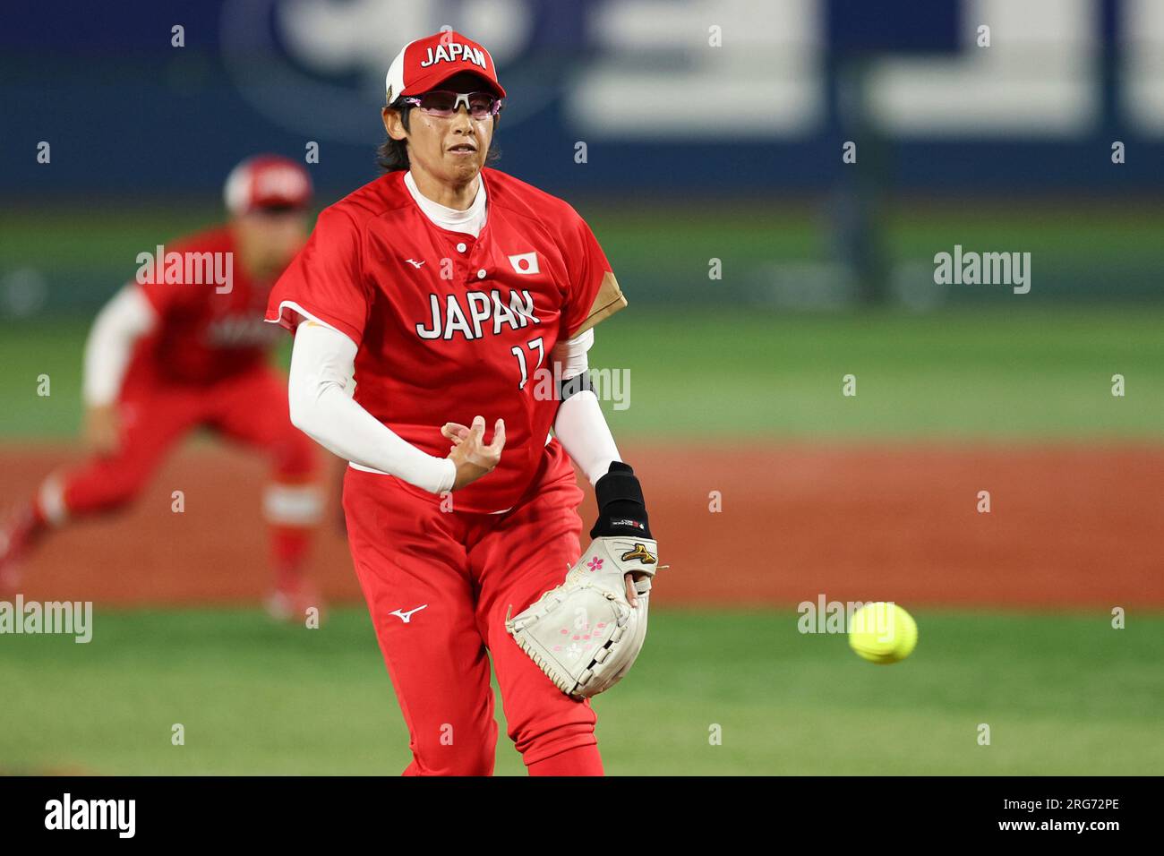 Japanese pitcher Yukiko Ueno throws a ball during the three - game ...