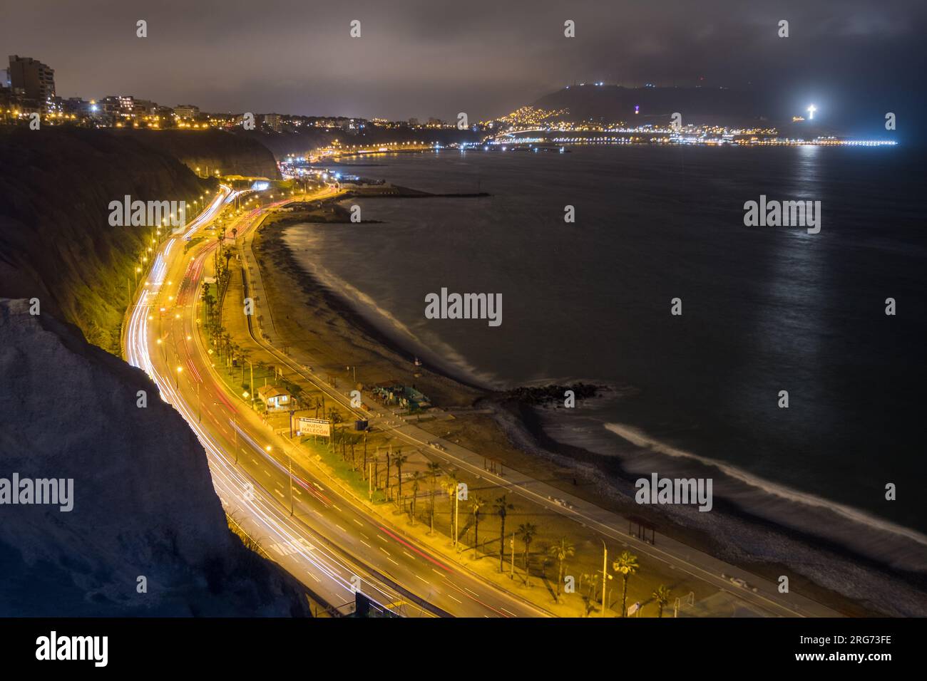 Night view of the ravines and streets against the Pacific Ocean, seen ...