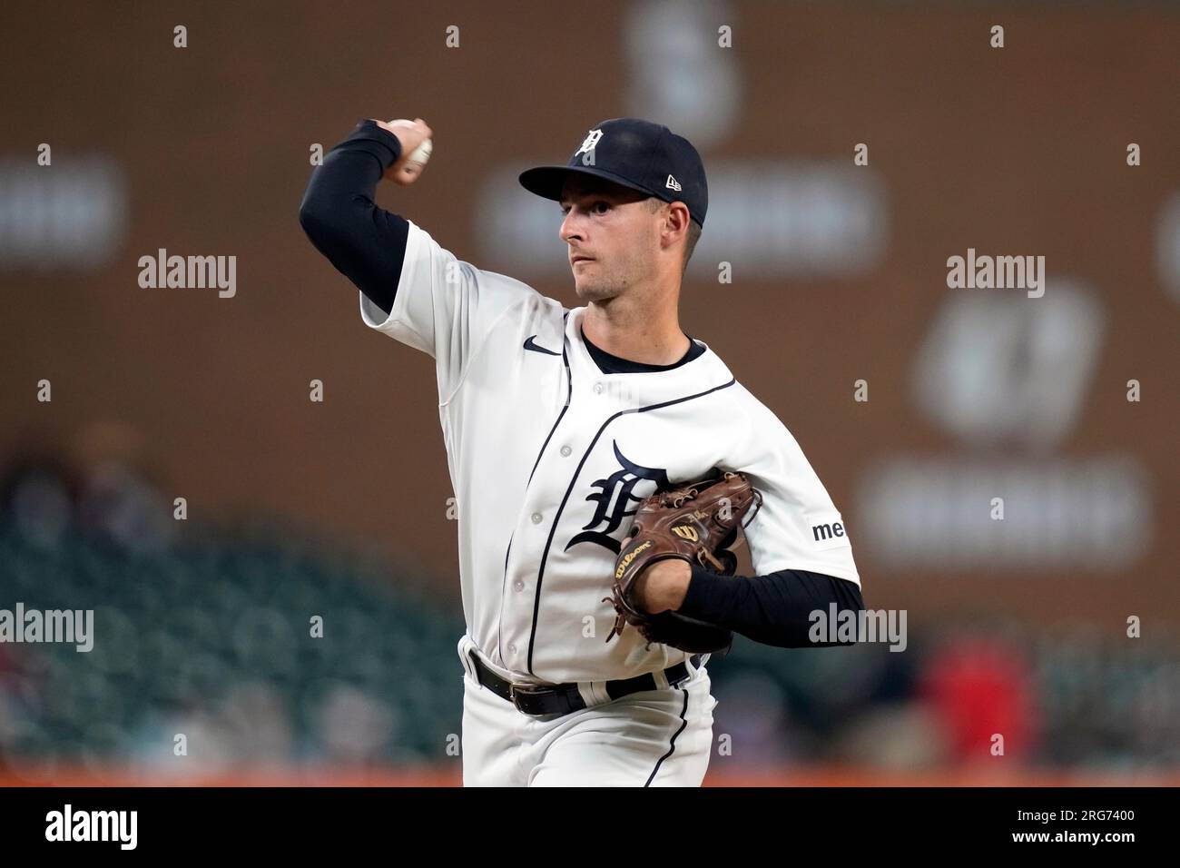 Detroit Tigers utilityman Zack Short throws during the ninth inning of ...